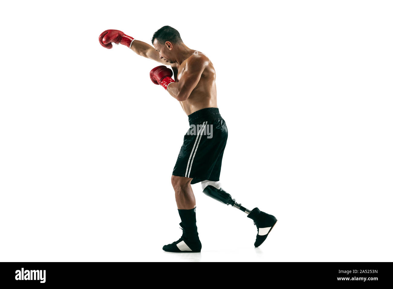 Full length portrait of muscular sportsman with prosthetic leg, copy ...
