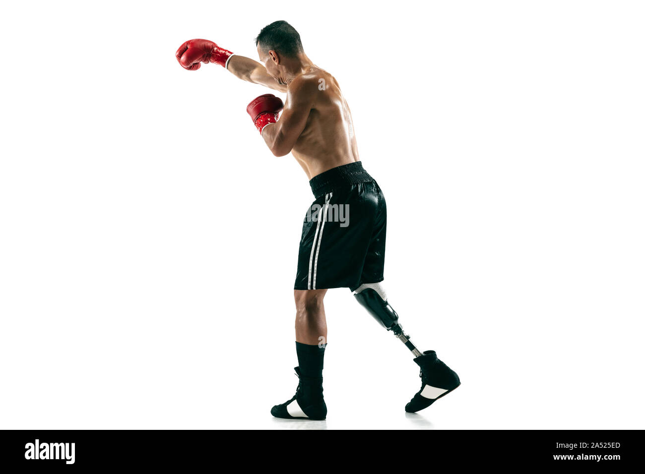 Full length portrait of muscular sportsman with prosthetic leg, copy ...