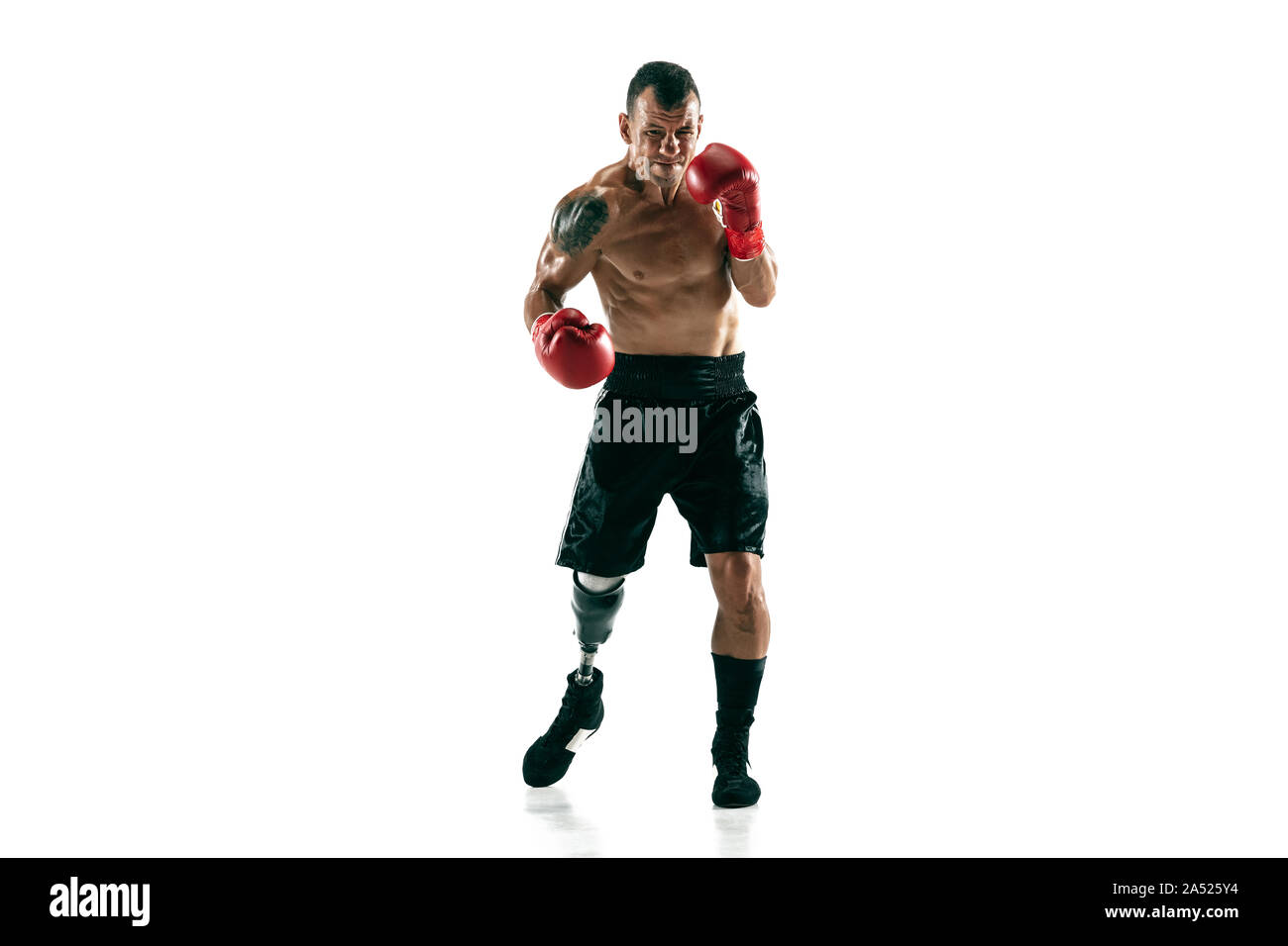 Full length portrait of muscular sportsman with prosthetic leg, copy ...