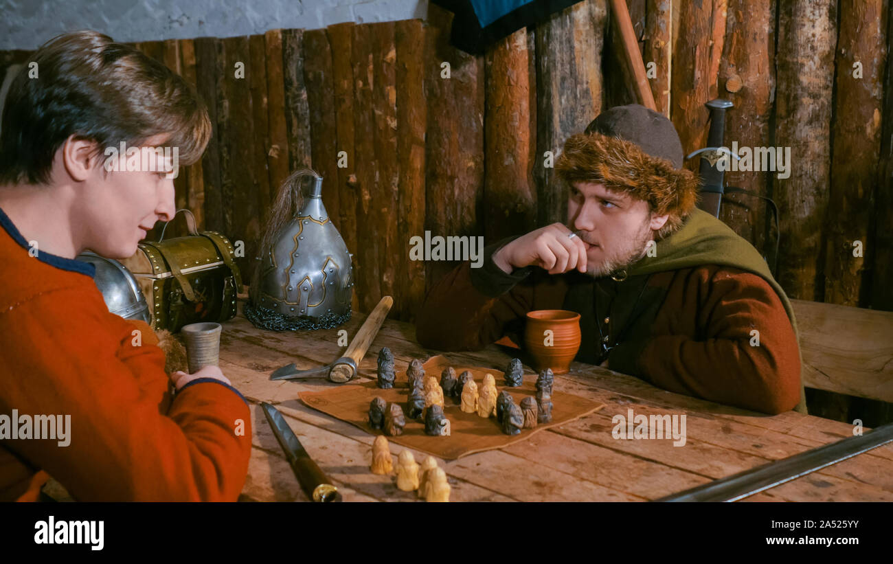 Pensive men playing game chess hi-res stock photography and images - Alamy