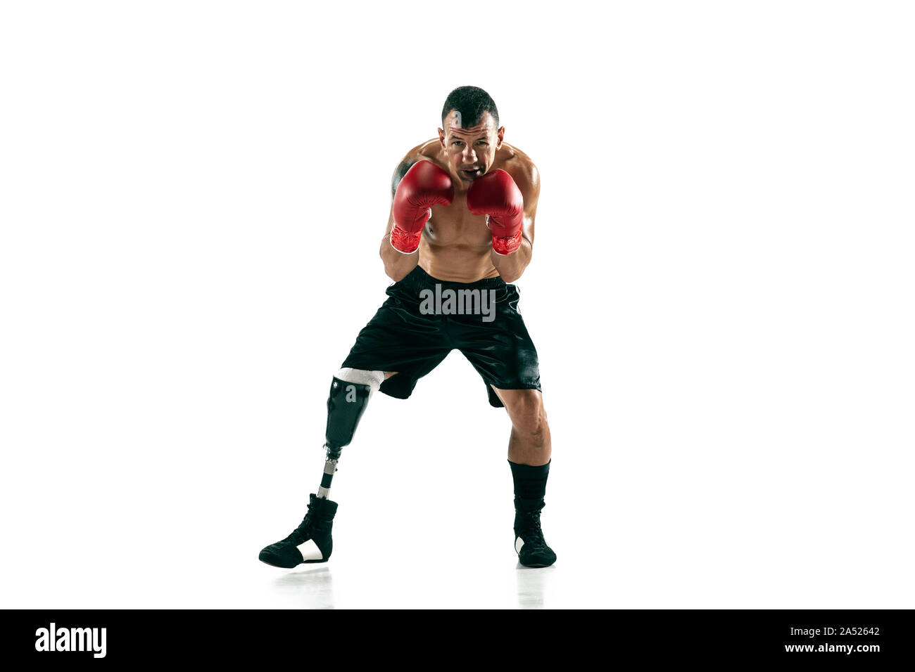 Full length portrait of muscular sportsman with prosthetic leg, copy ...