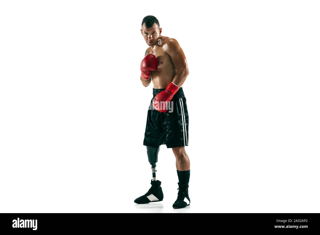 Full length portrait of muscular sportsman with prosthetic leg, copy ...