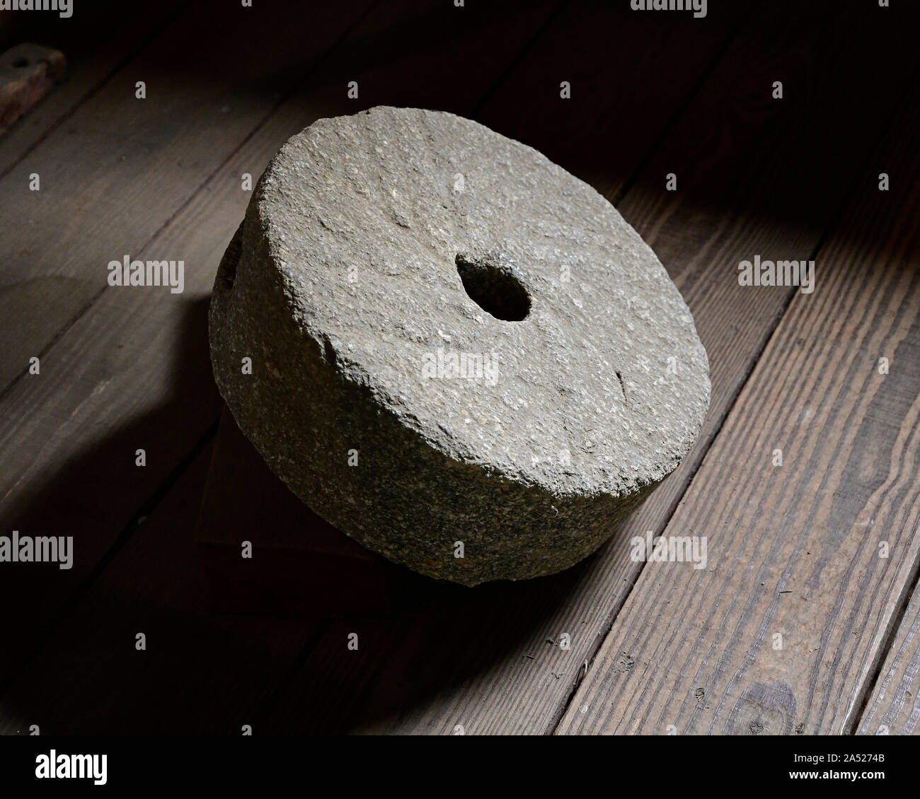 Old millstones hi-res stock photography and images - Alamy