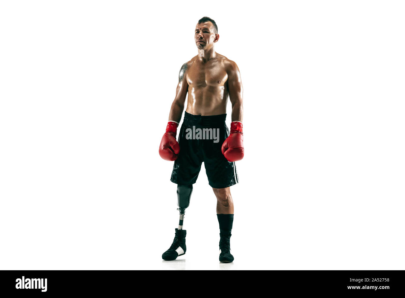 Full length portrait of muscular sportsman with prosthetic leg, copy ...