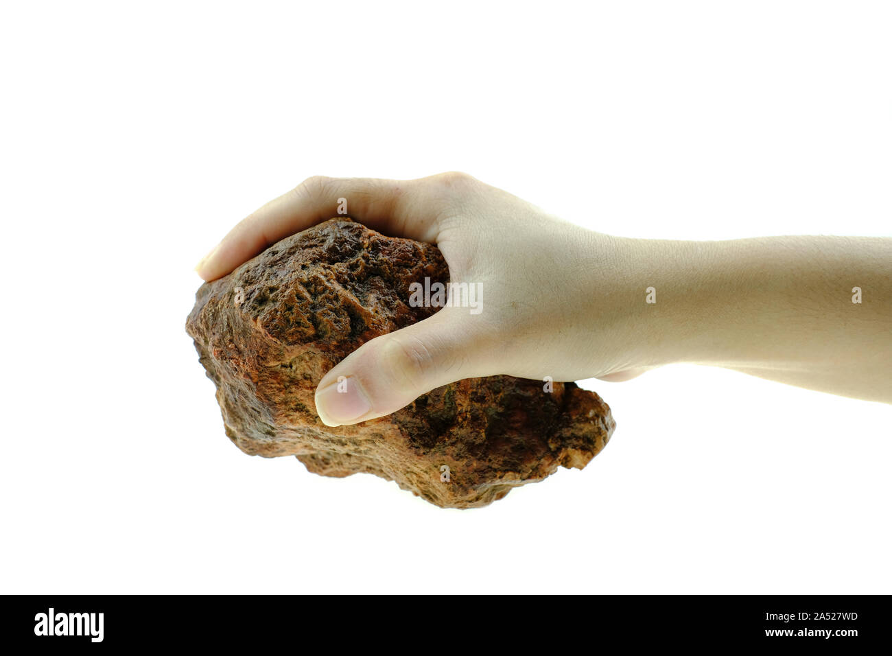 Close up hand is holding stone isolated at white background Stock Photo ...