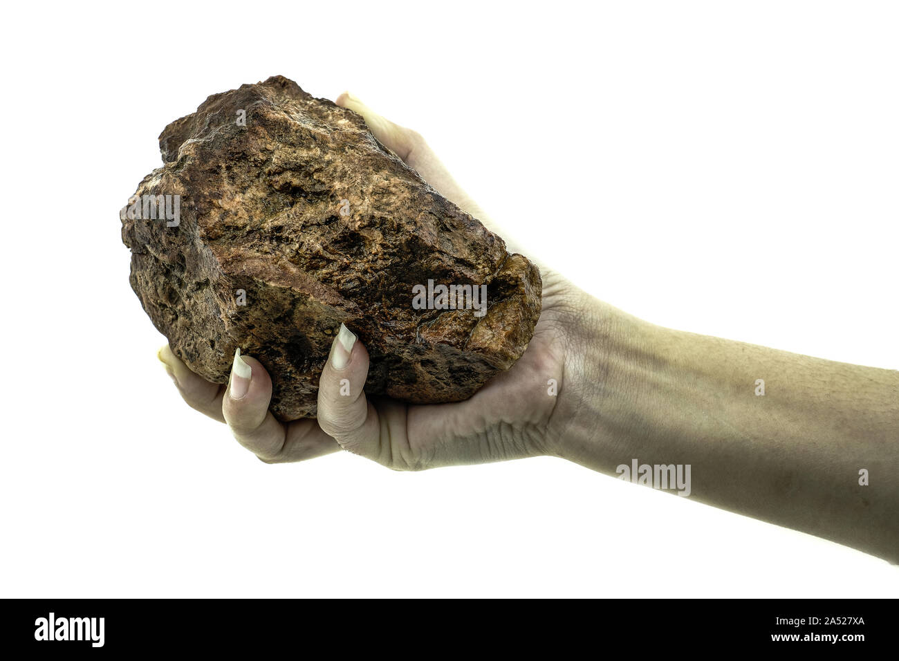 Close up hand is holding stone isolated at white background Stock Photo ...