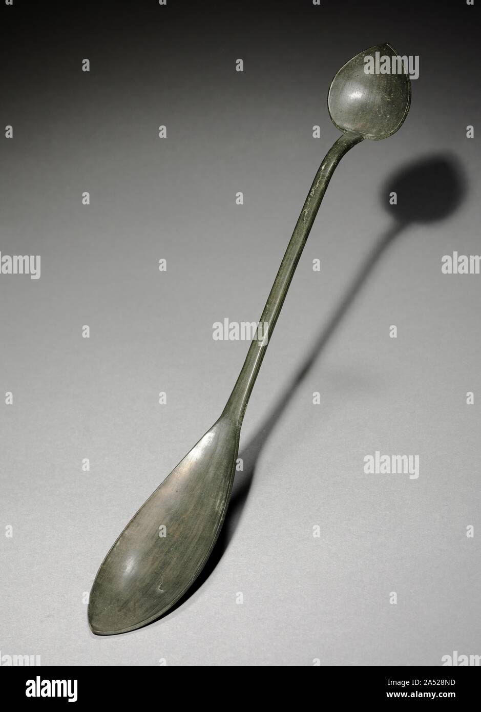 Spoon with Dual Heads, 918-1392. This bronze spoon has dual heads: one ...