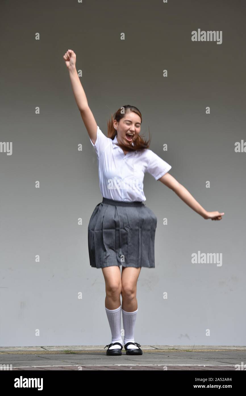 Teenage Female And Freedom Standing Stock Photo - Alamy