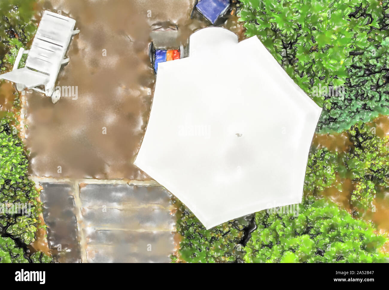 Vertical aerial photograph of a bright parasol on a terrace, taken from ...