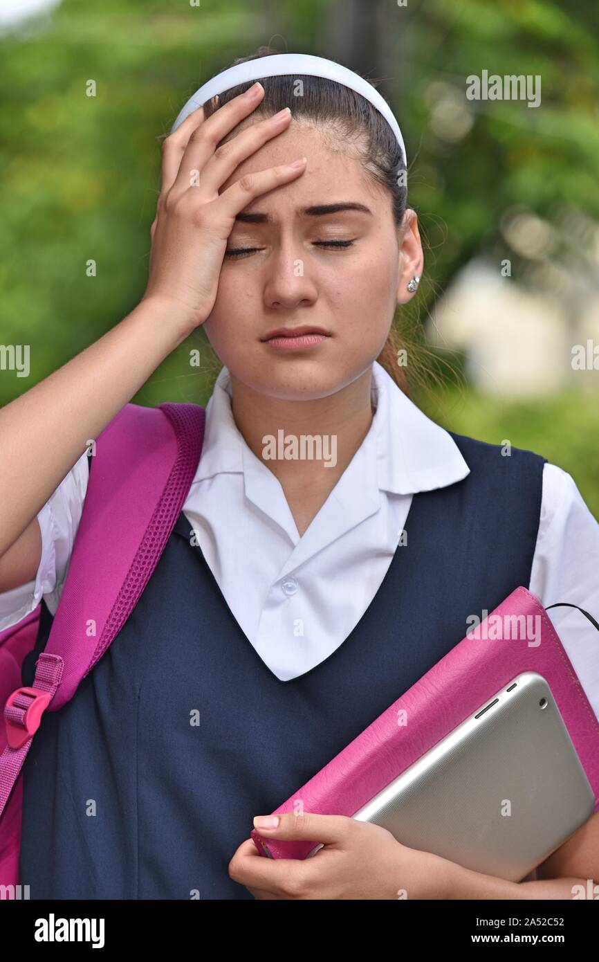 Female Student With Fever Wearing Uniform Stock Photo - Alamy