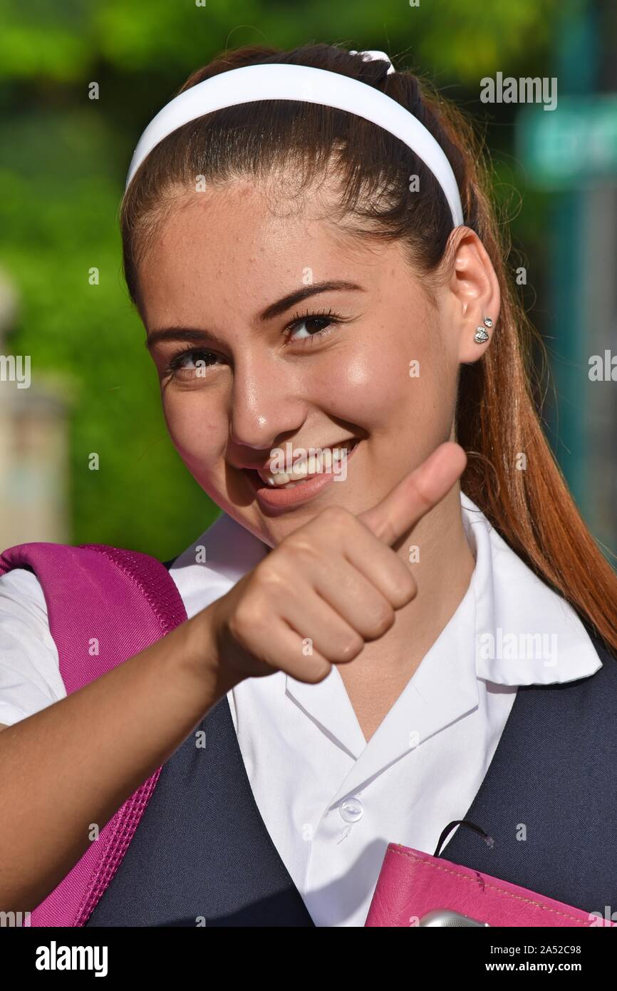 Happy Catholic Colombian Person With Books Stock Photo - Alamy
