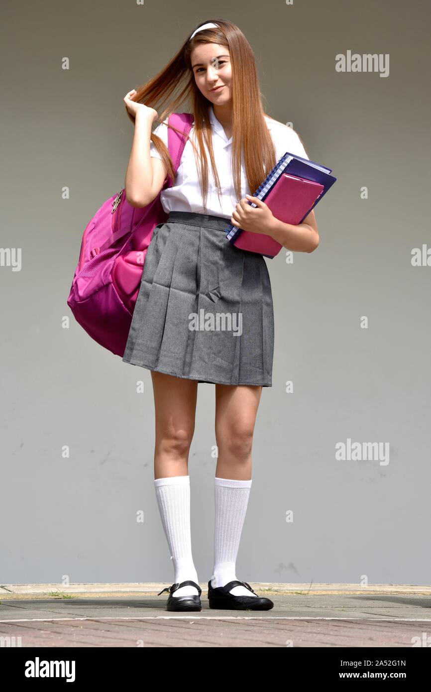Female Student Holding Books Stock Photo - Alamy