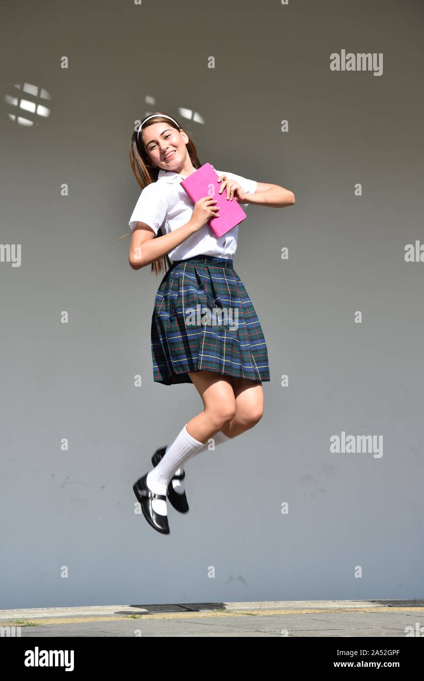 Female Student Teenager Jumping Stock Photo - Alamy