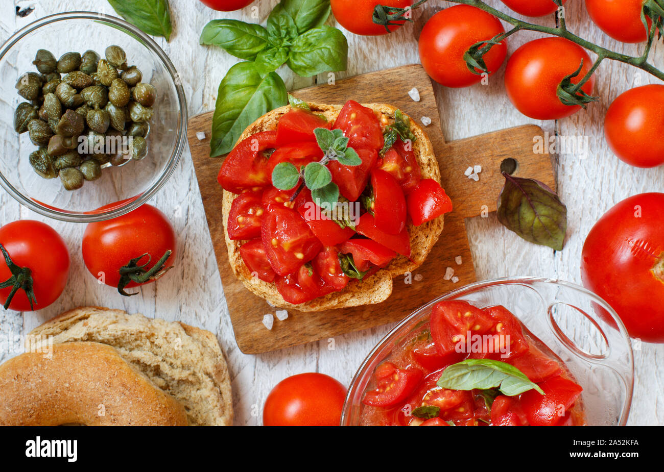 Frisella, typical south italian bread seasond with tomatoes and herbs ...