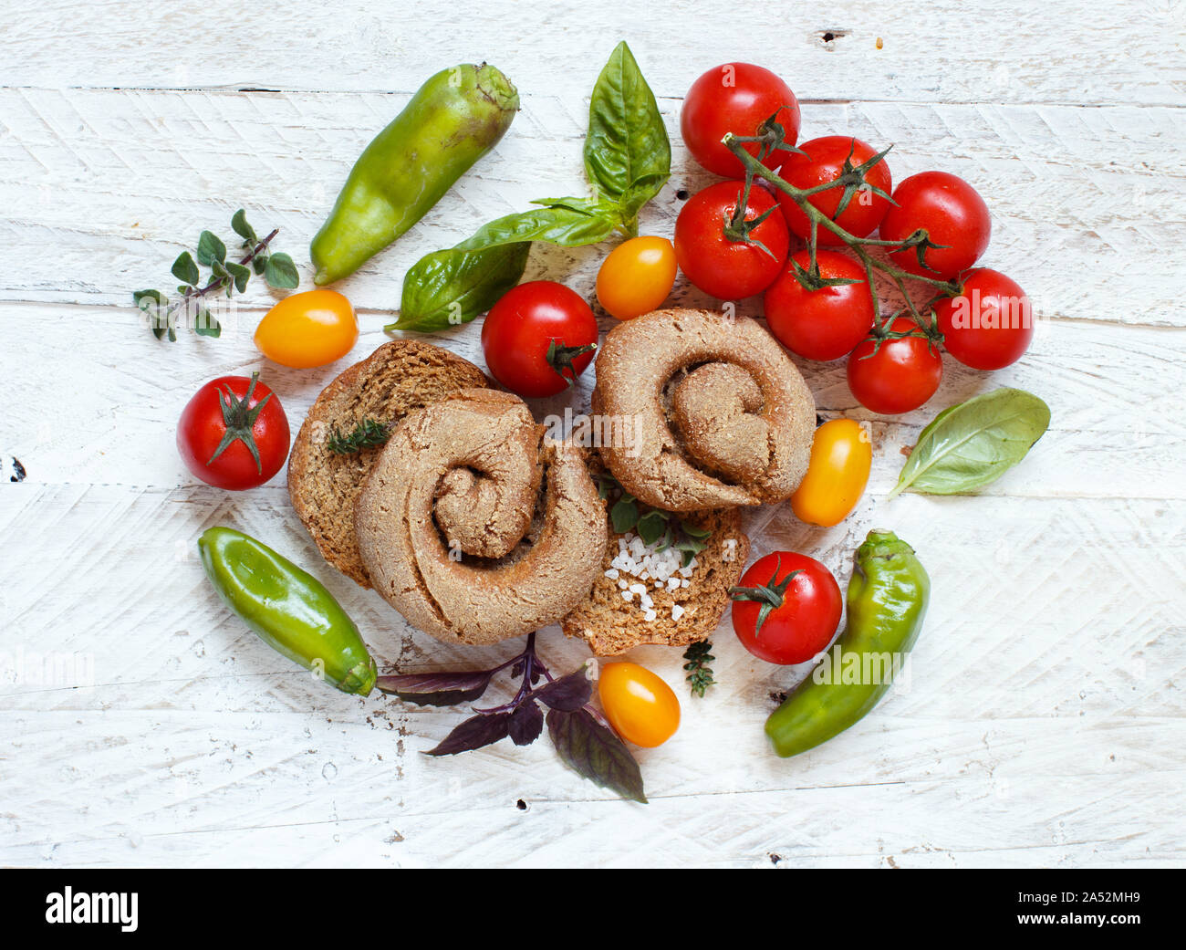 Frisella, typical south italian bread with vegetabes Stock Photo - Alamy