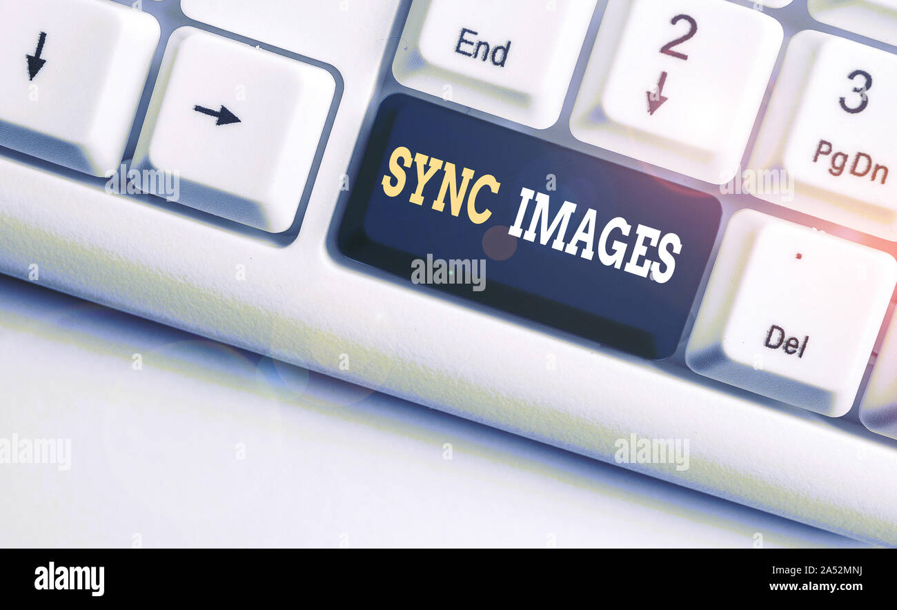Conceptual hand writing showing Sync Images. Concept meaning Making ...