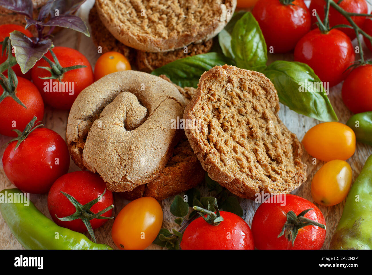 Frisella, typical south italian bread with vegetabes Stock Photo - Alamy