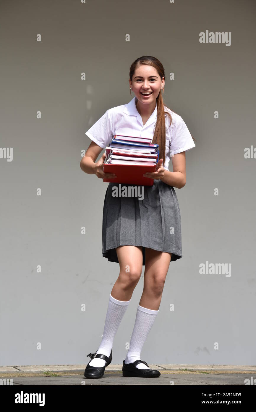 Happy Female Student Wearing School Uniform While Standing Stock Photo ...