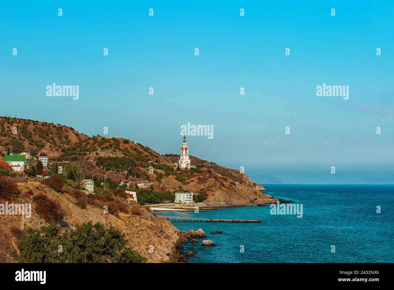 Temple lighthouse in honor of St. Nicholas on the seashore. Monument to ...