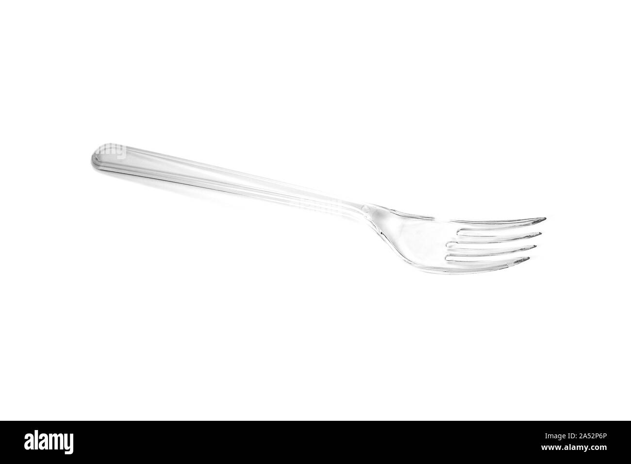 Transparent plastic fork isolated on white background. Close up Stock ...