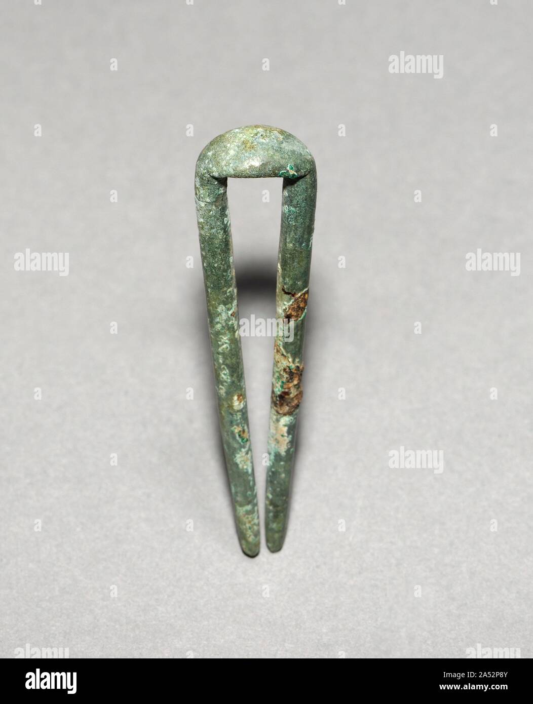 Bronze topknot pin hi-res stock photography and images - Alamy