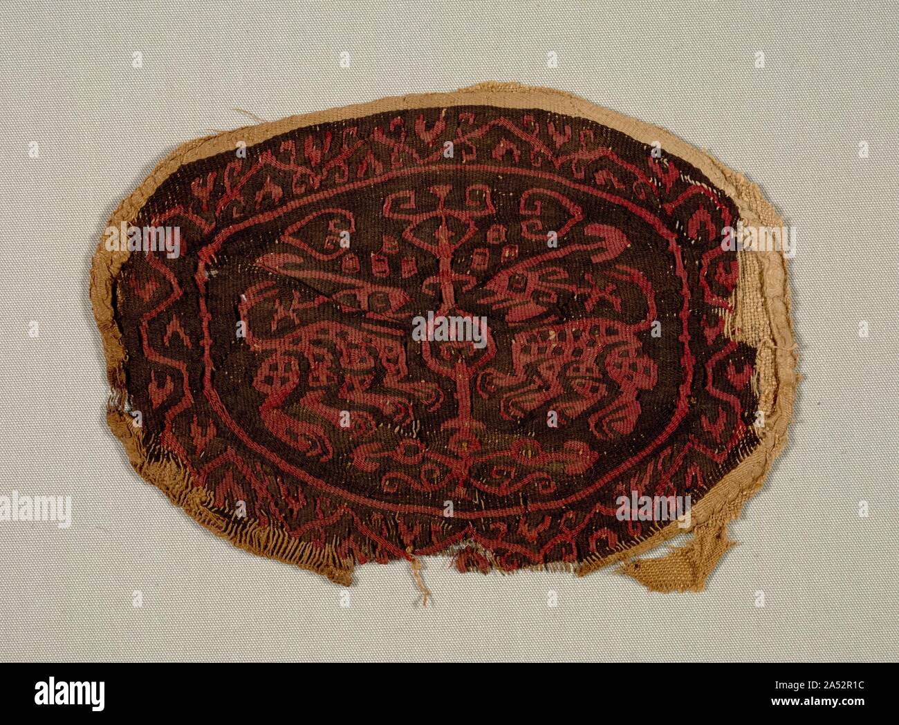 Two Confronted Animals from a Tunic, 700s-800s. Two spotted animals ...