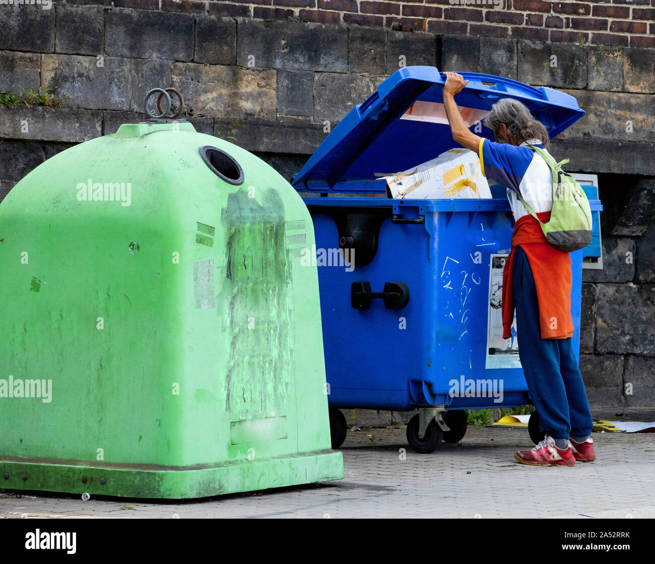 homeless man searching the trash Stock Photo - Alamy