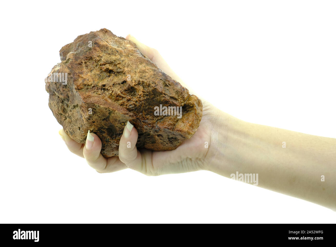 Close up hand is holding stone isolated at white background Stock Photo ...