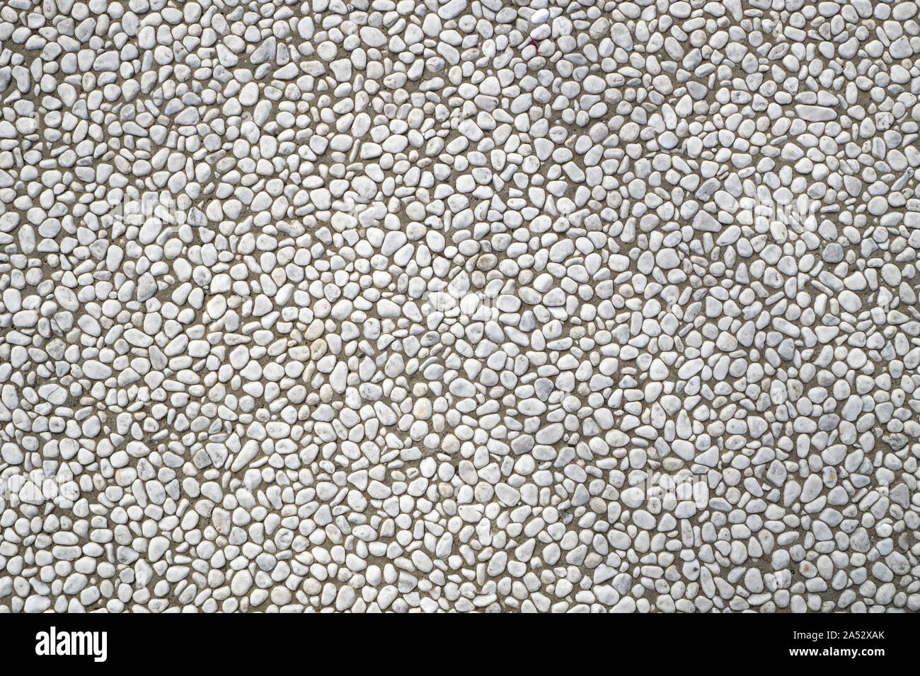 Pavement pebless stone seemless background texture Stock Photo - Alamy