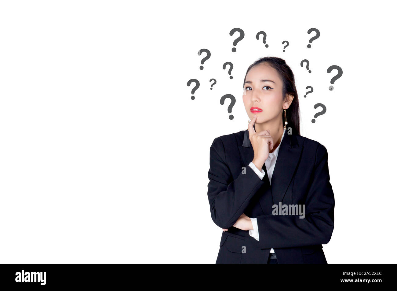 Young woman thinking question marks Cut Out Stock Images & Pictures - Alamy