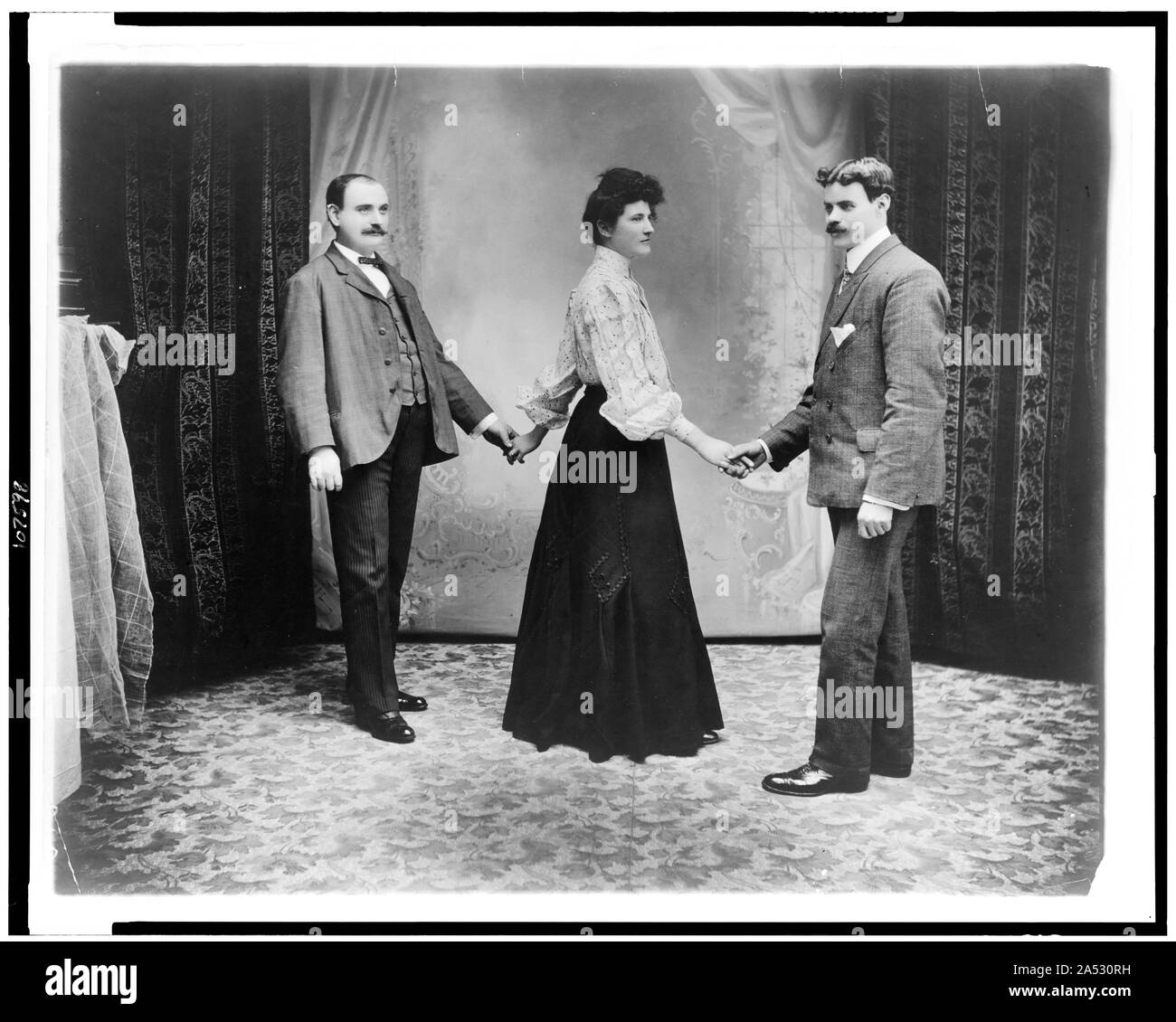 Three men on stage Black and White Stock Photos & Images - Alamy