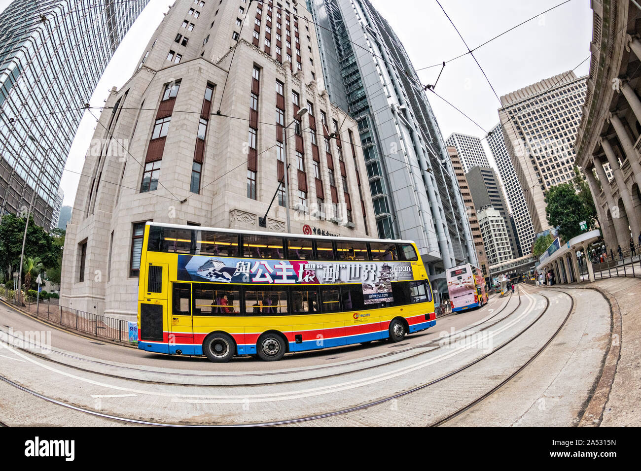 Fisheye view of a double decker bus traveling past the Old Bank of ...