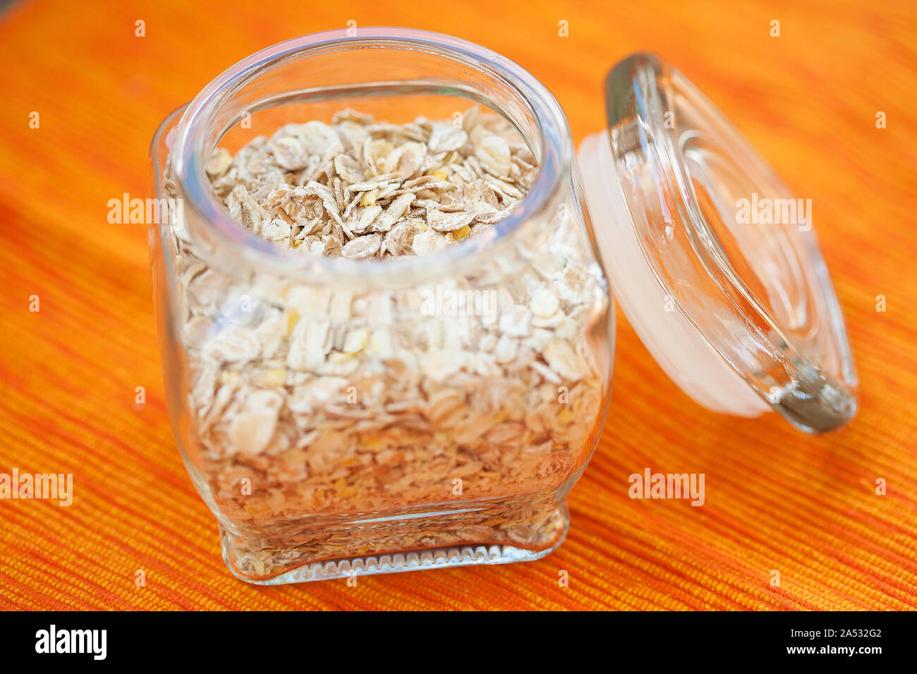 oatmeal in a jar on orange napkin Stock Photo - Alamy