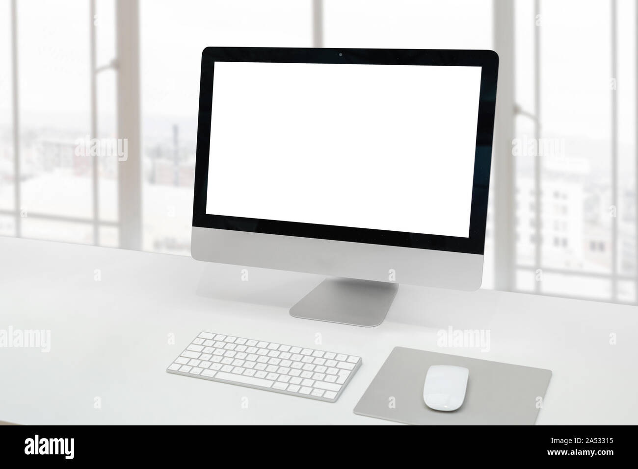 Computer display on office desk with isolated screen for mockup, design ...
