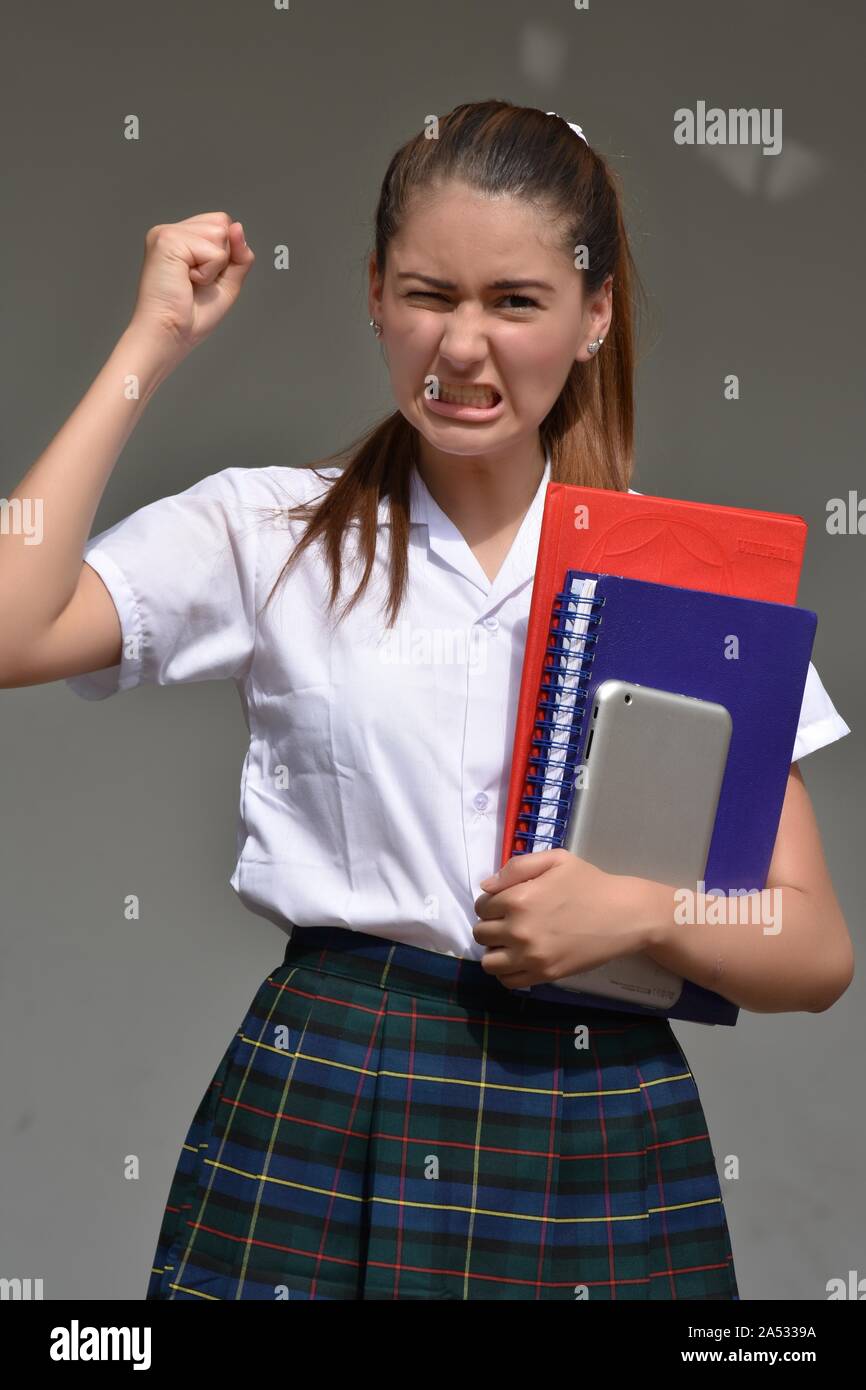 Mad Catholic Colombian Female Student Stock Photo - Alamy