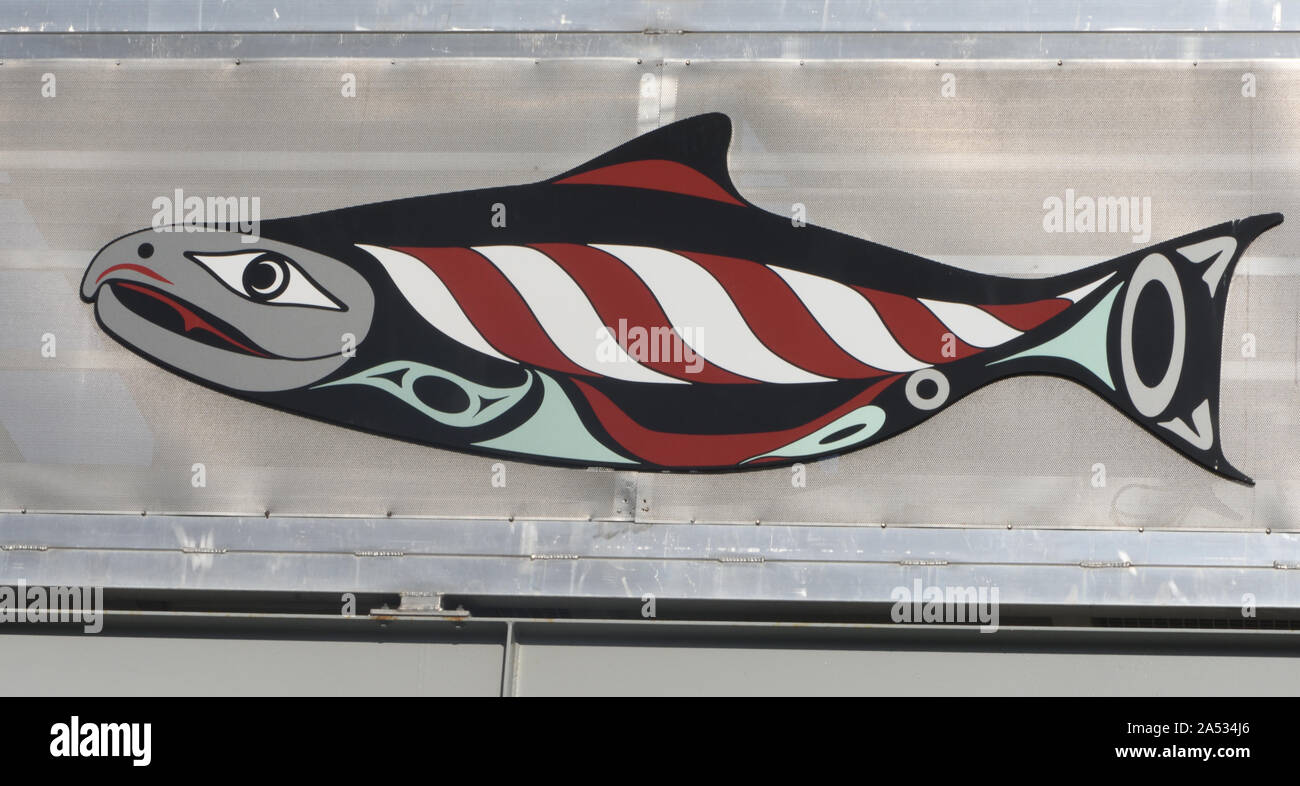 Image of a salmon in First Nation style on the modern ferry terminal ...