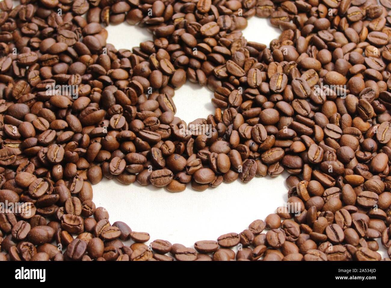 The picture shows a face made of coffee beans Stock Photo - Alamy