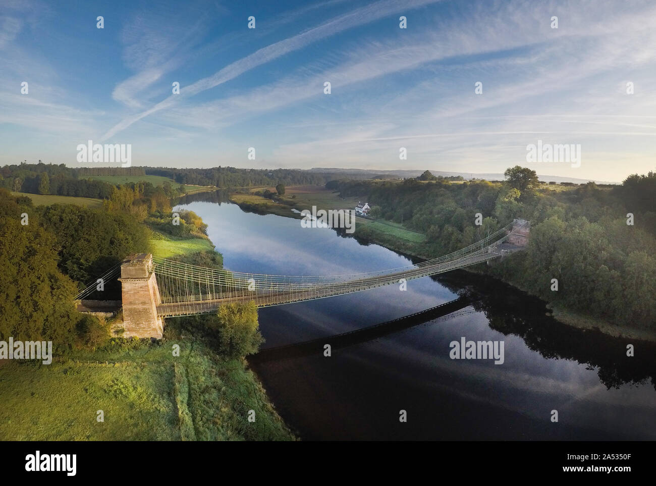 On the Scottish border the Union Chain Bridge crossing the River Tweed ...