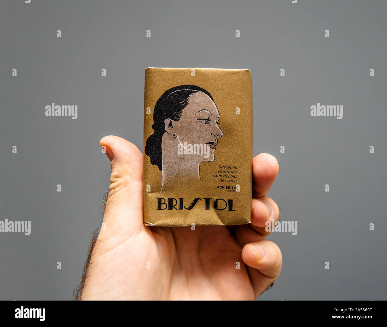 Paris, France - Oct 5, 2019: Man hand holding Portuguese Soap bar with ...