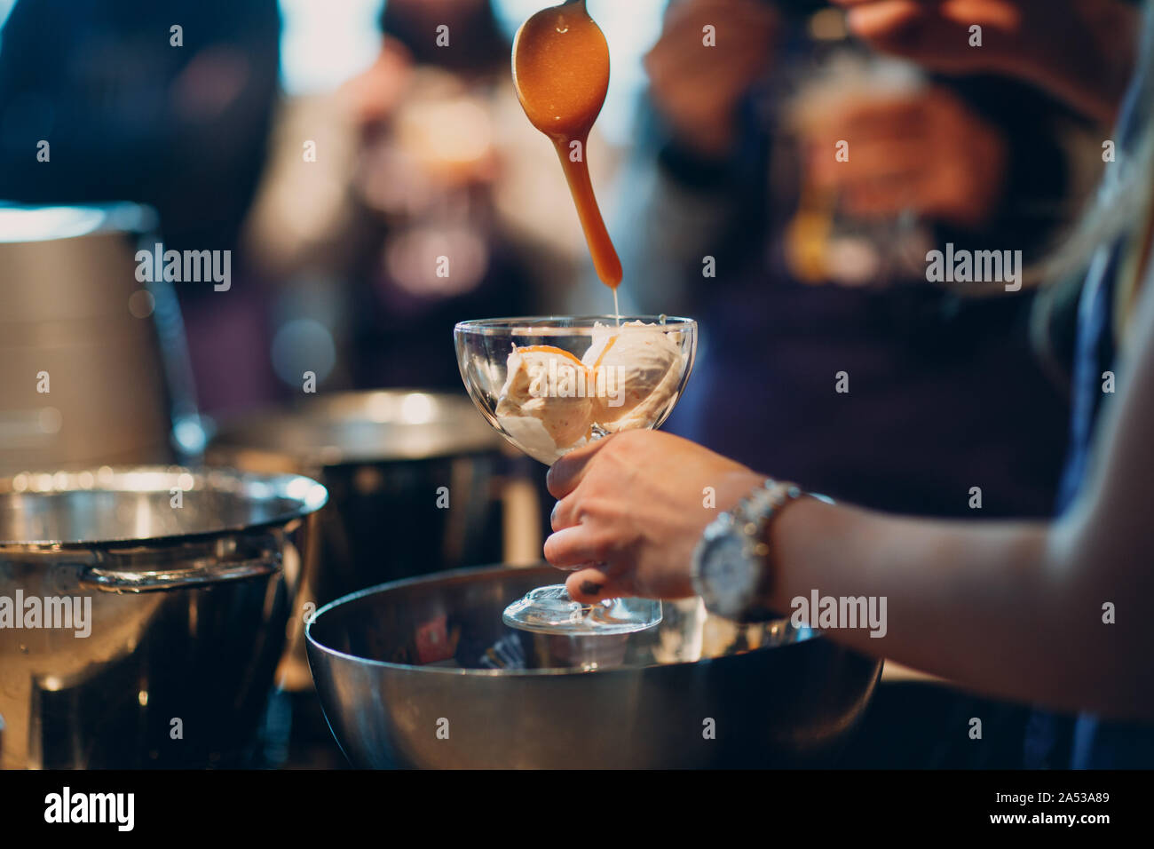 People put ice cream in creamers Stock Photo - Alamy