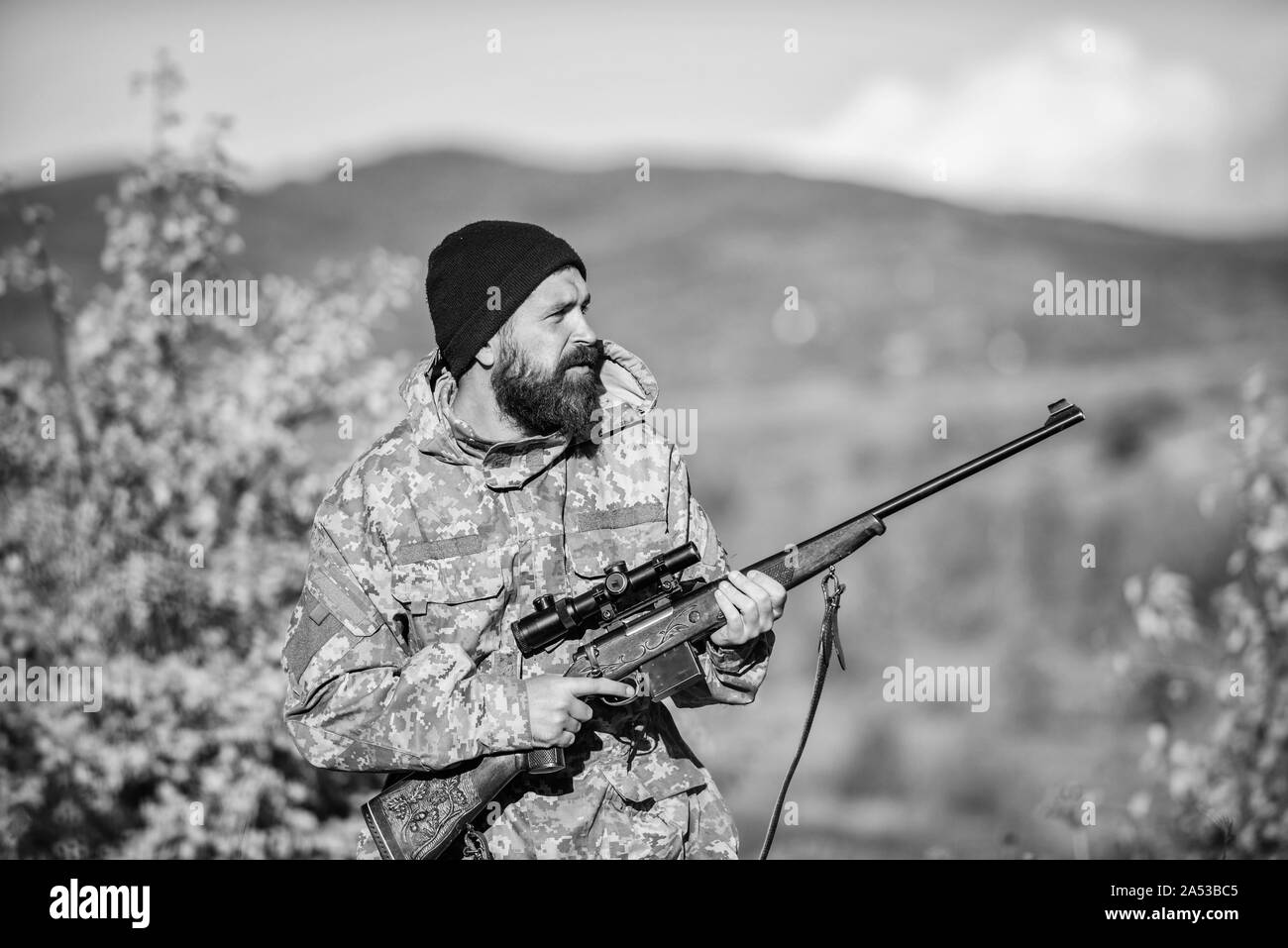 Hunting hunter brutal man Black and White Stock Photos & Images - Alamy