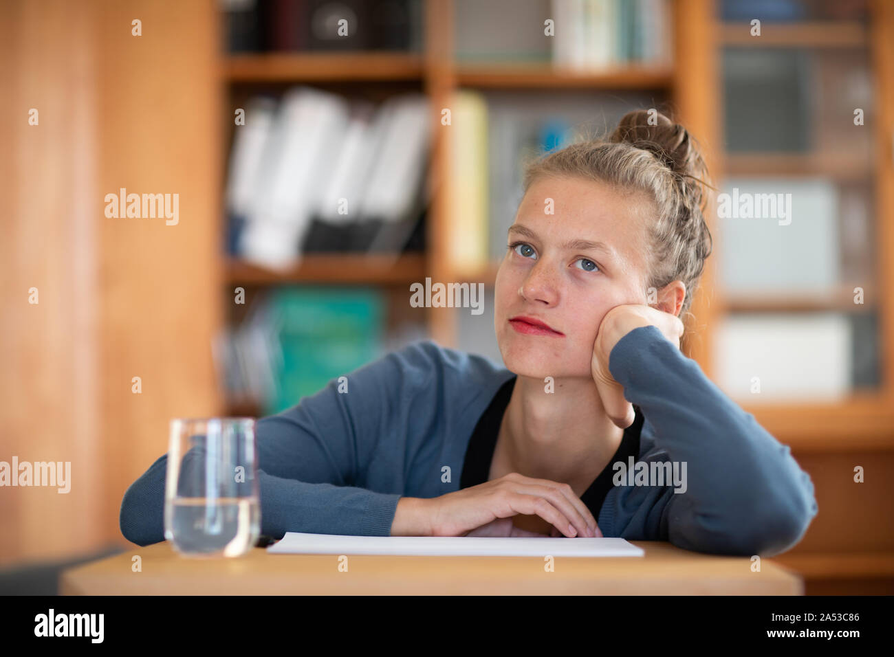 student learning in a library Stock Photo - Alamy