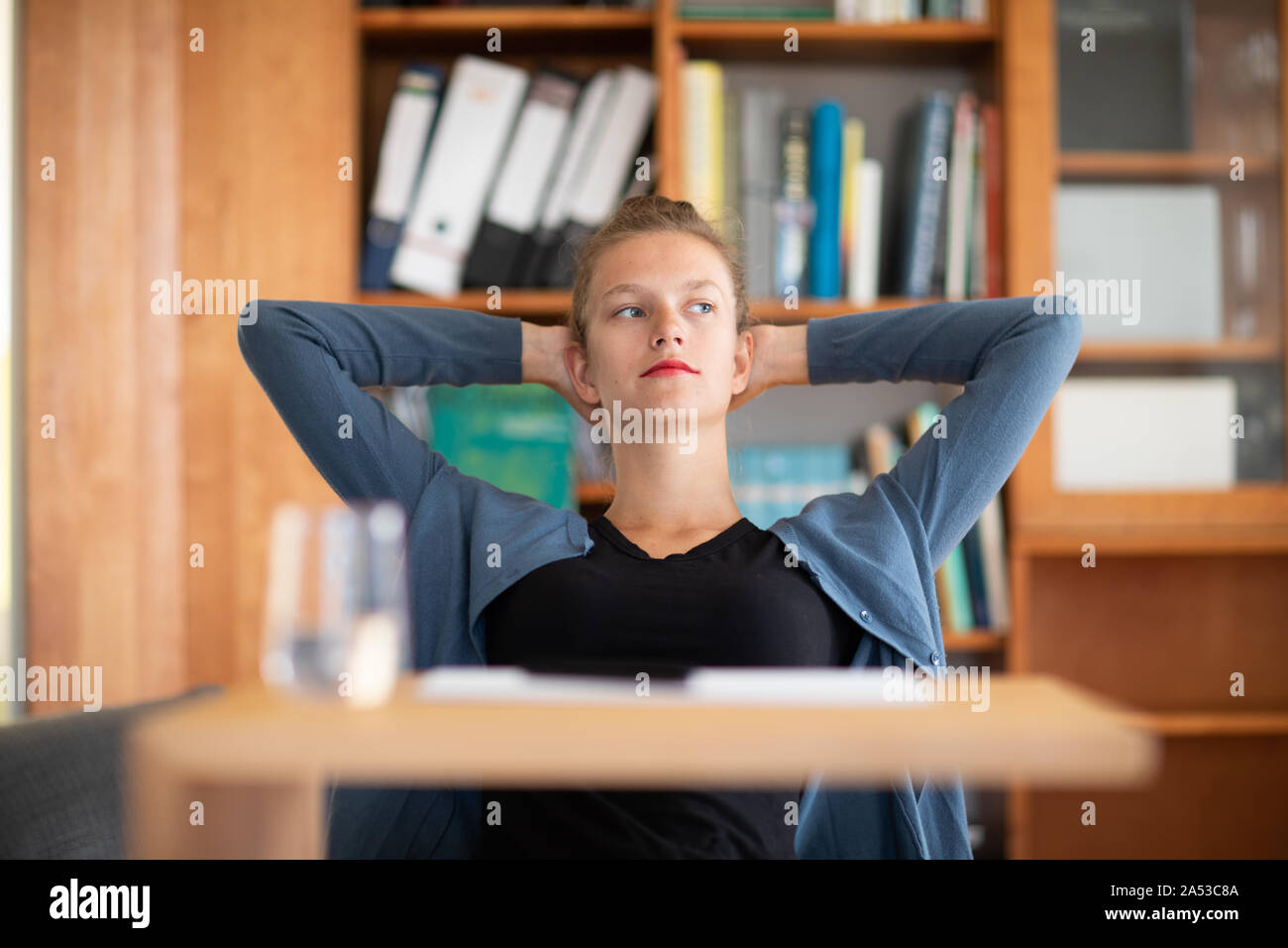 student learning in a library Stock Photo - Alamy