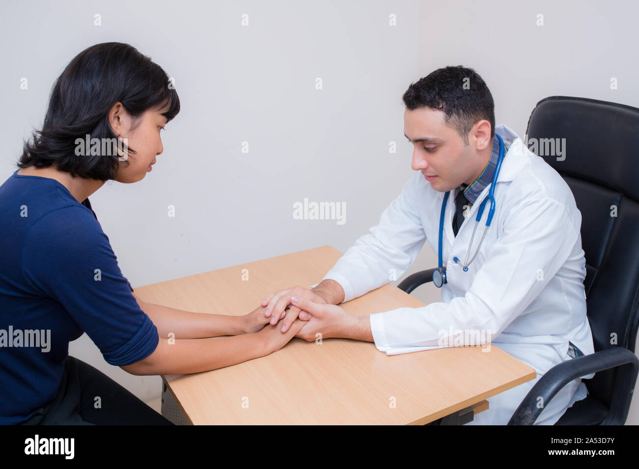 Doctor hand holding patient hand hi-res stock photography and images ...