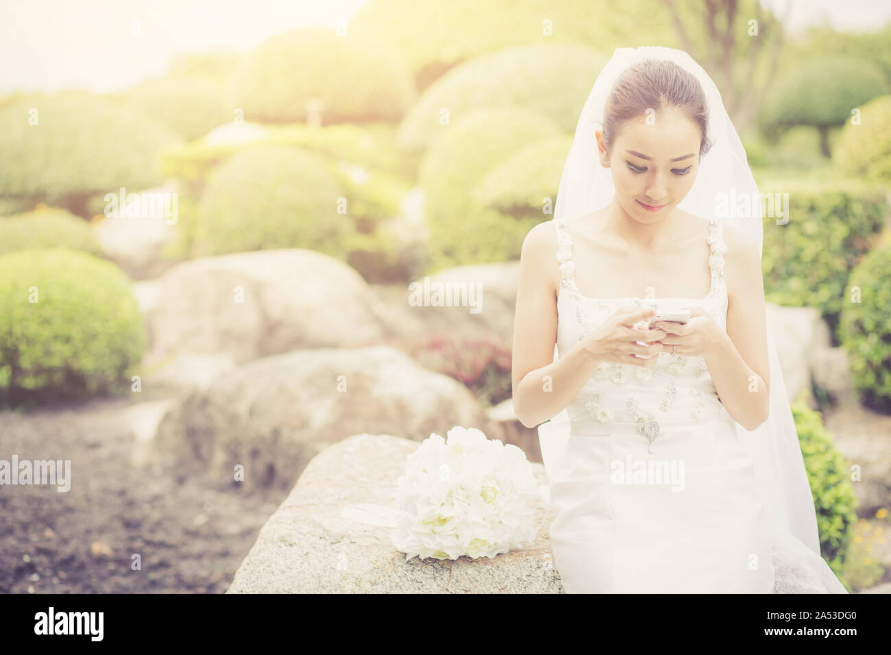 Bride on the phone hi-res stock photography and images - Alamy