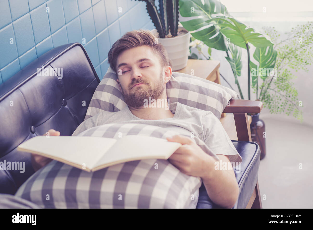 Sleep sofa man hi-res stock photography and images - Alamy
