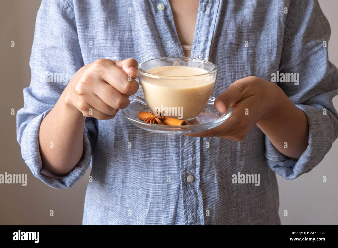 Woman cinnamon tea hi-res stock photography and images - Alamy
