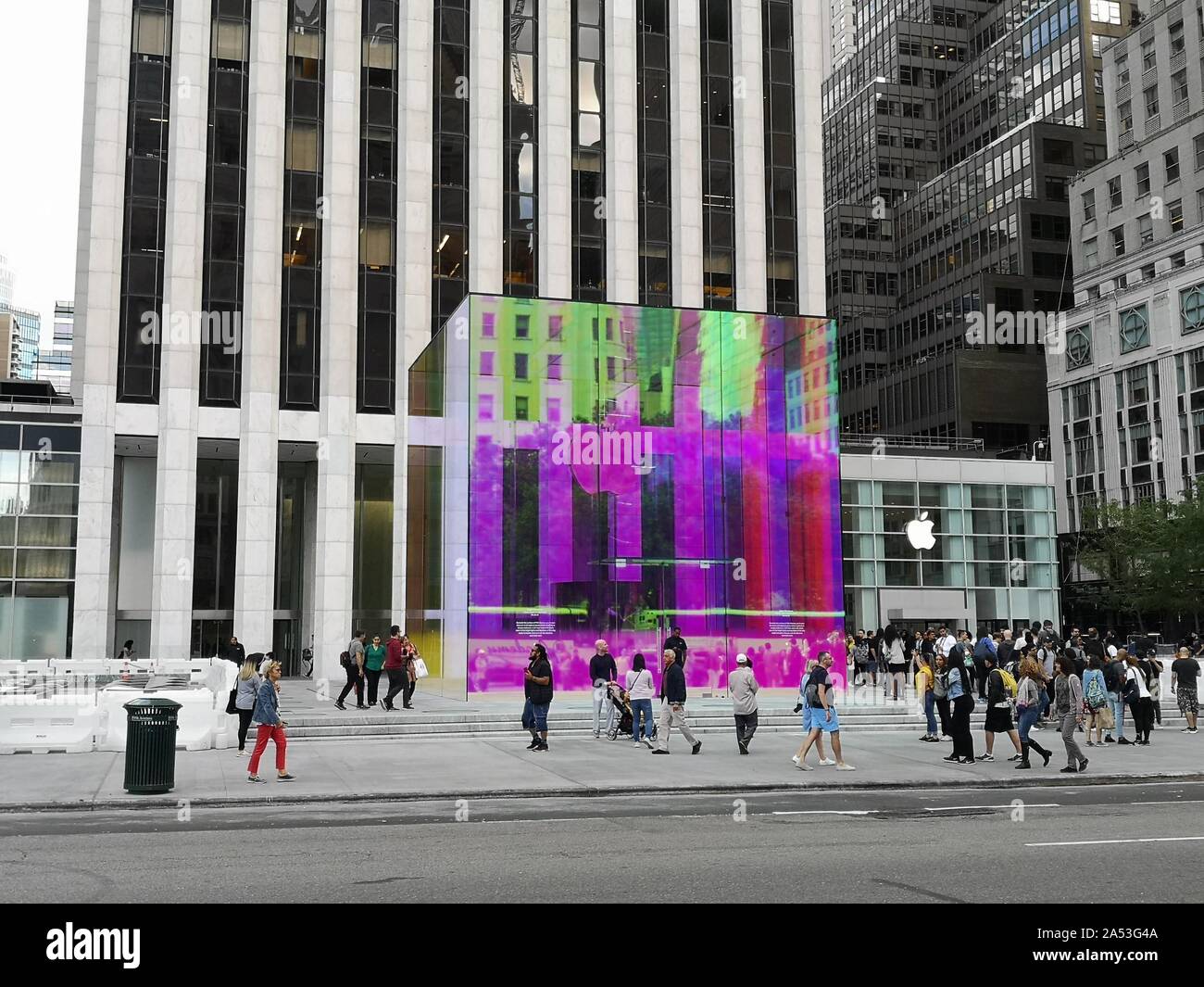 New York, USA. 14th Sep, 2019. Passers-by walk past the Apple Store on ...