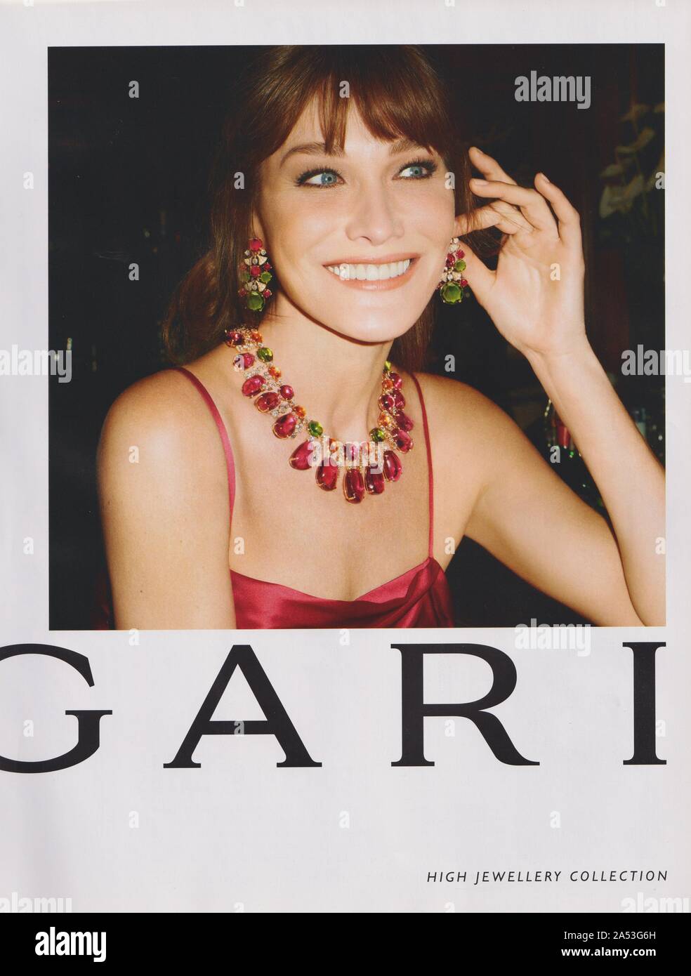 poster advertising BVLGARI Roma fashion house with Carla Bruni in paper ...