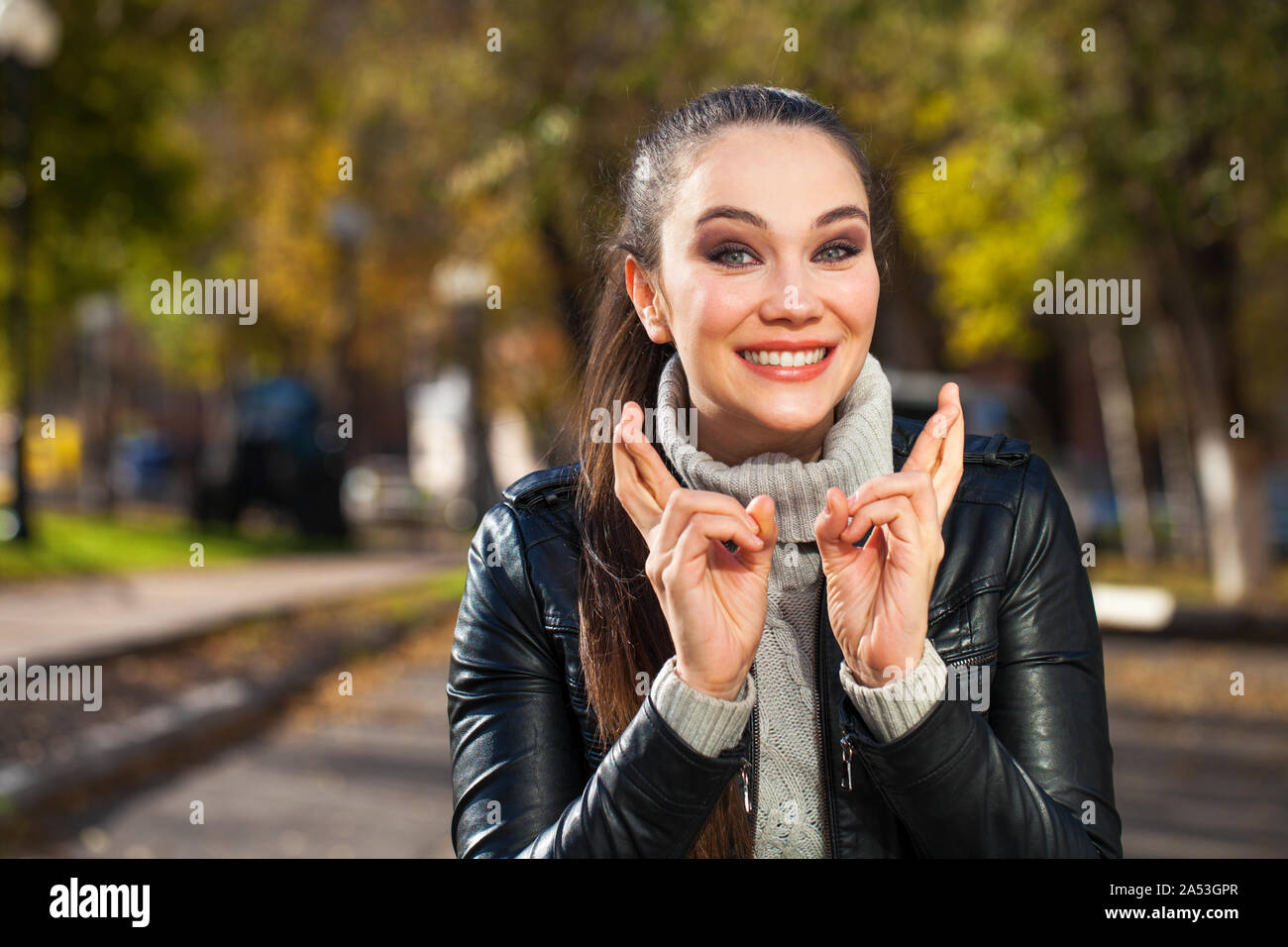 Body language and emotions concept. Young beautiful satisfied woman ...